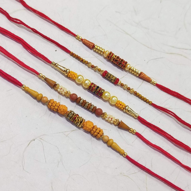 Regal Set of 5 Rakhis with Beads and American Diamond Highlights - PRPL3327